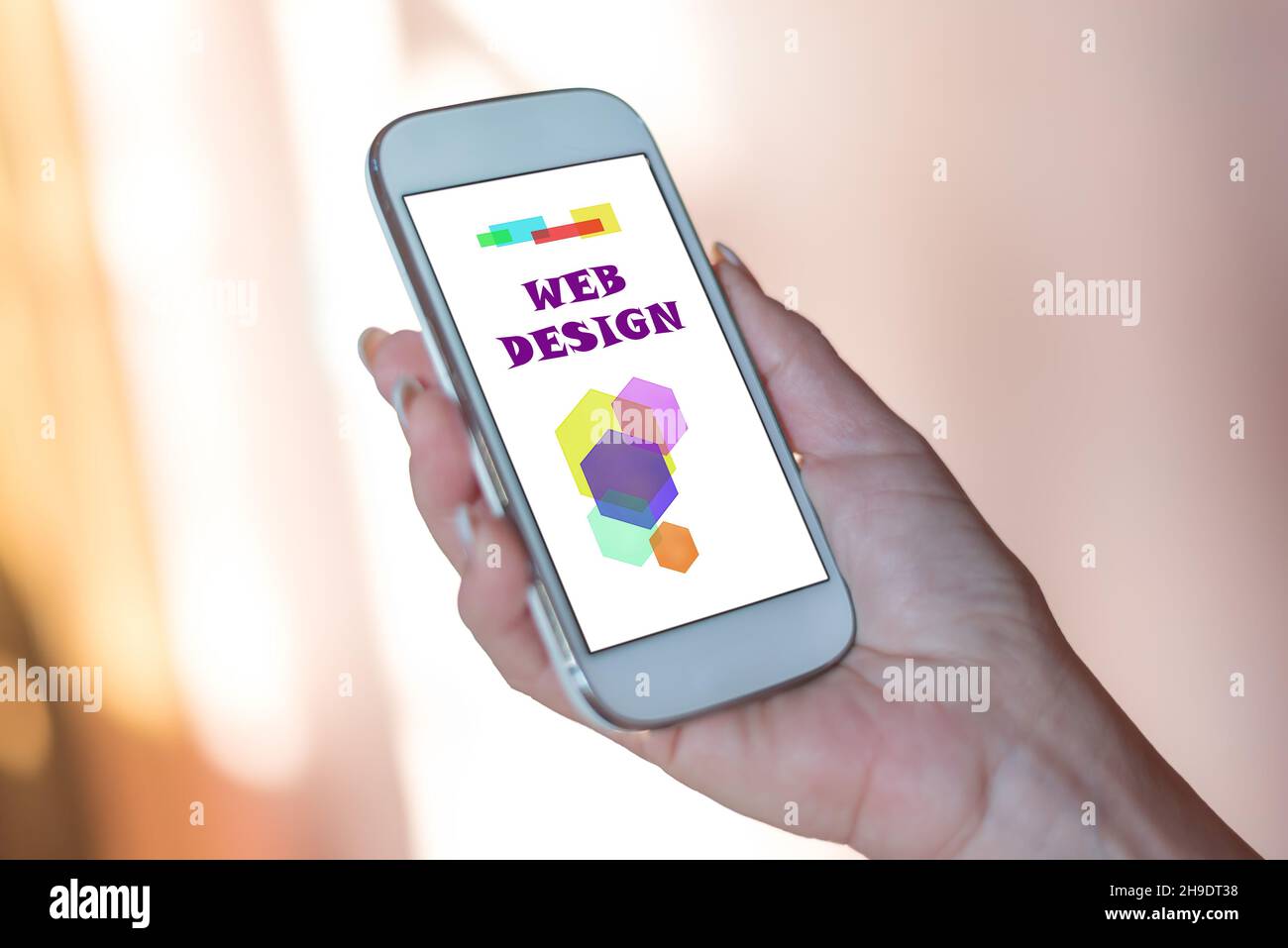 Smartphone screen displaying a web design concept Stock Photo - Alamy