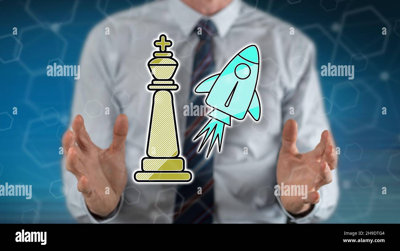 Winning business strategy concept between hands of a man in background ...