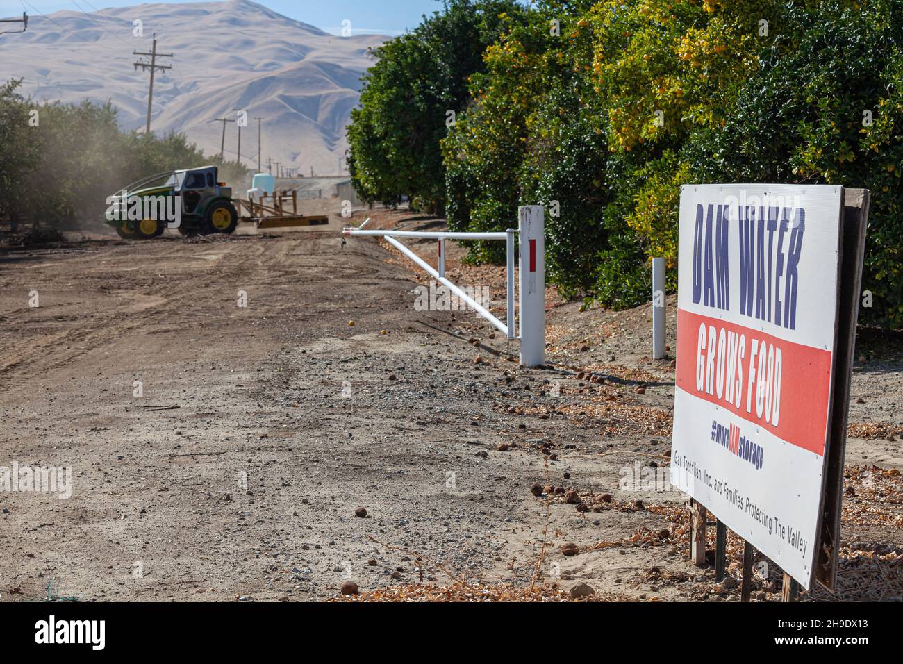 A "Dam water grows food" sign promotes the building of more water ...