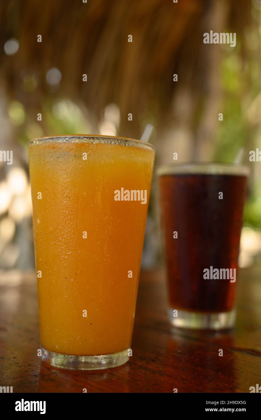 The photo shows Coca Cola refreshments and passion fruit juice. Photo ...