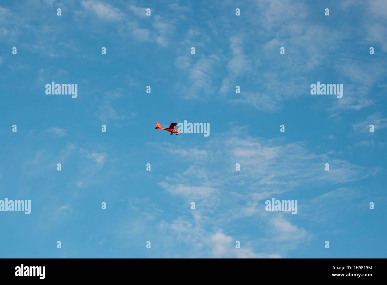 Red bi wing plane flying hi-res stock photography and images - Alamy