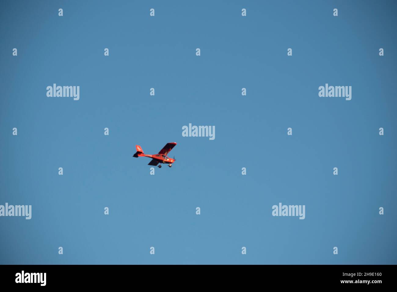 Red bi wing plane flying hi-res stock photography and images - Alamy