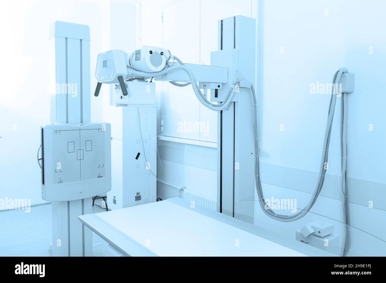 X-ray department in modern hospital. Radiology room with scan machine ...