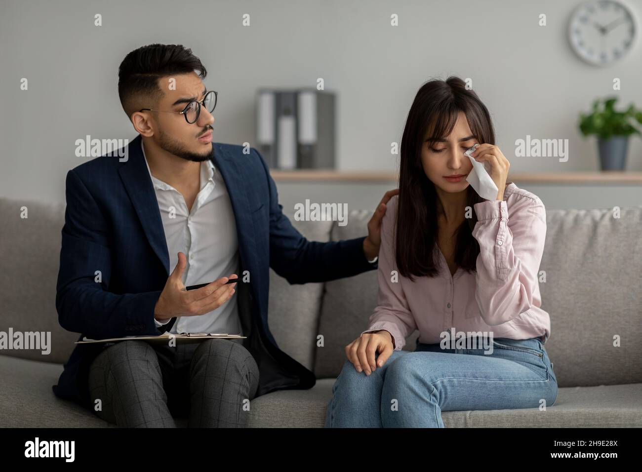 Upset arab lady with nervous breakdown consulting psychologist, crying ...
