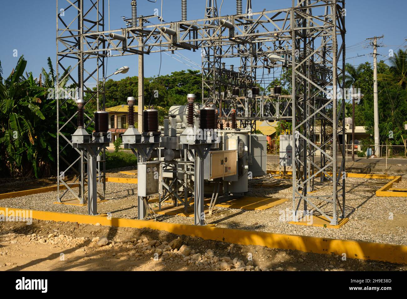 Electrical substation in carribbian island. Around exotic plants ...