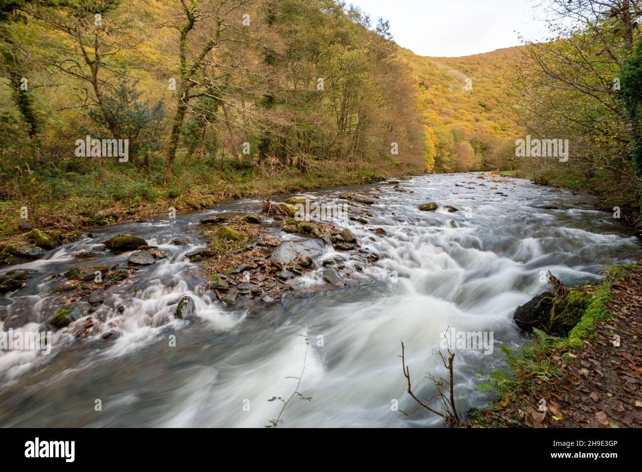 Long exposure of the East Lyn River flowing through the Doone Valley at ...