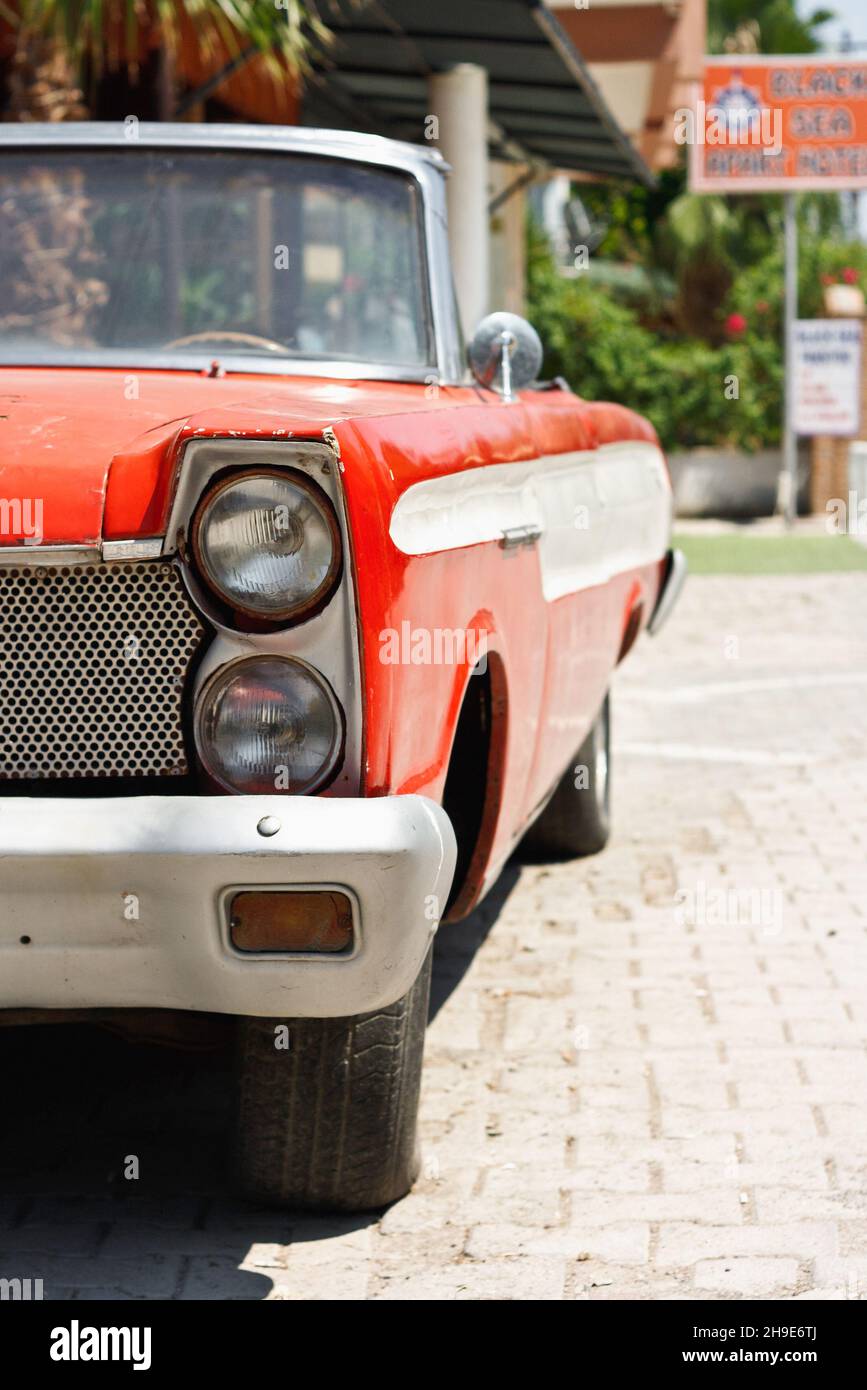 Old classic red car cabriolet in street. Retro automobile convertible ...