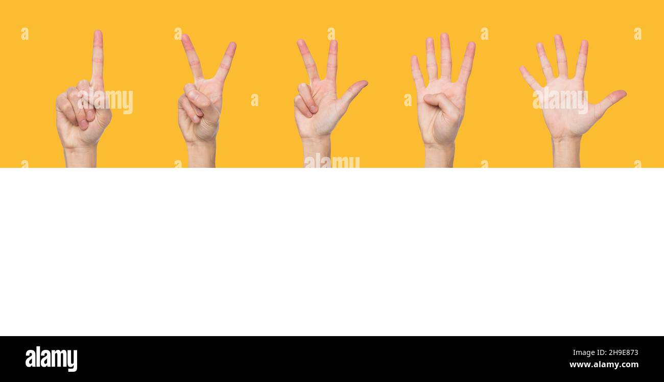 Closeup of male hands showing counting gesture Stock Photo - Alamy