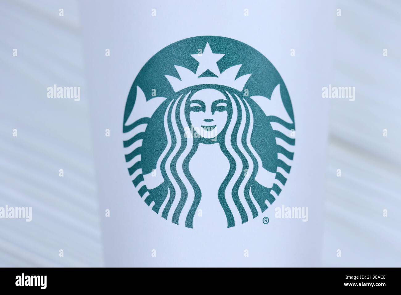 KHARKOV, UKRAINE - MARCH 15, 2021: Starbucks cup with green logo ...
