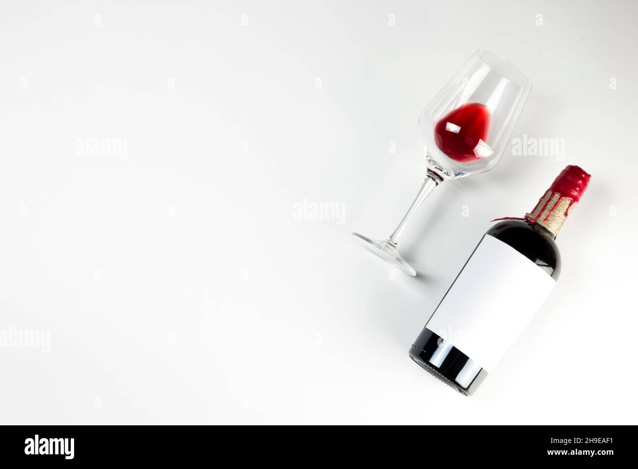 Wine flat lay, top view mockup abstract composition. Bottle and glass ...