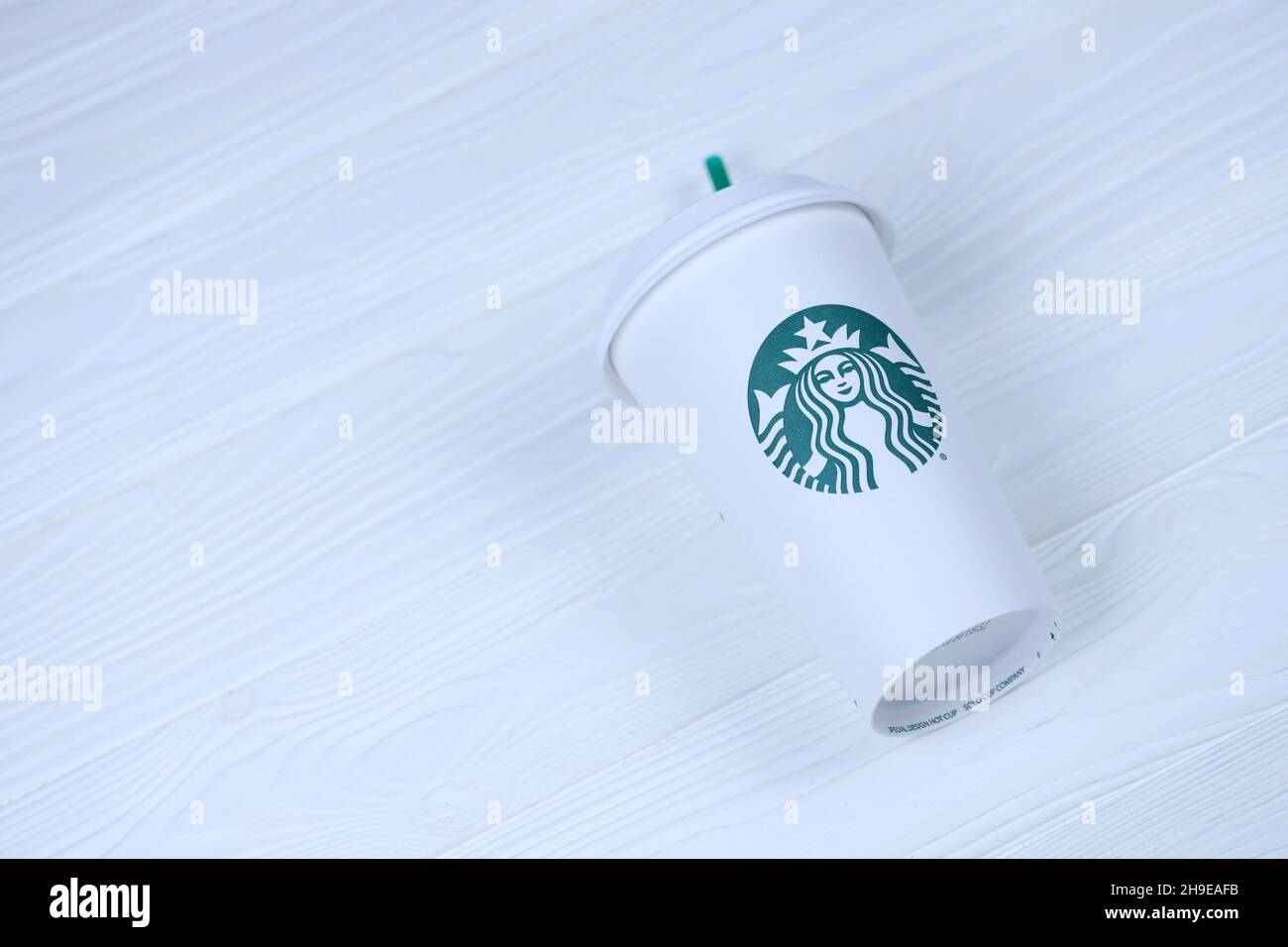 KHARKOV, UKRAINE - MARCH 15, 2021: Starbucks cup with green logo ...