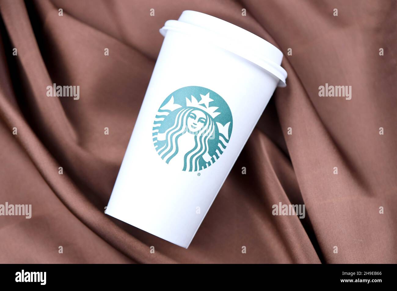 KHARKOV, UKRAINE - MARCH 15, 2021: Starbucks cup with green logo ...