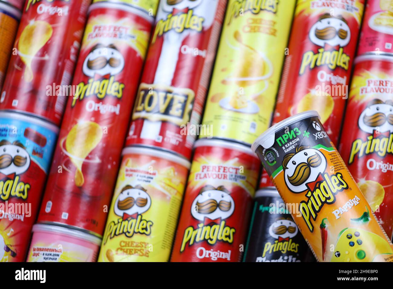 KHARKOV, UKRAINE - MARCH 30, 2021: Many Pringles cylinder chips boxes ...