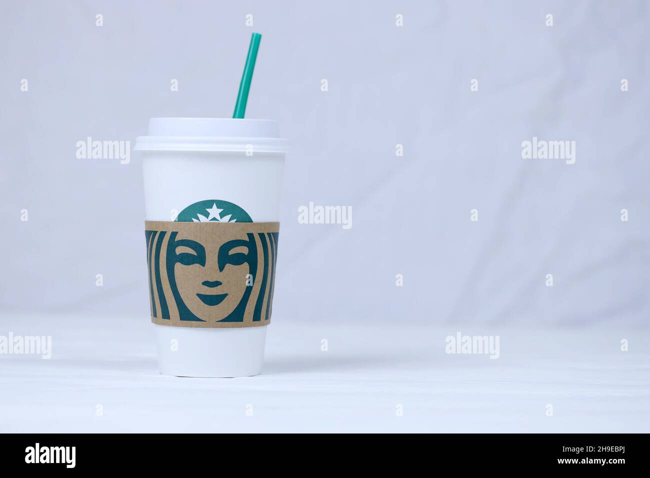 KHARKOV, UKRAINE - MARCH 15, 2021: Starbucks cup with green logo ...