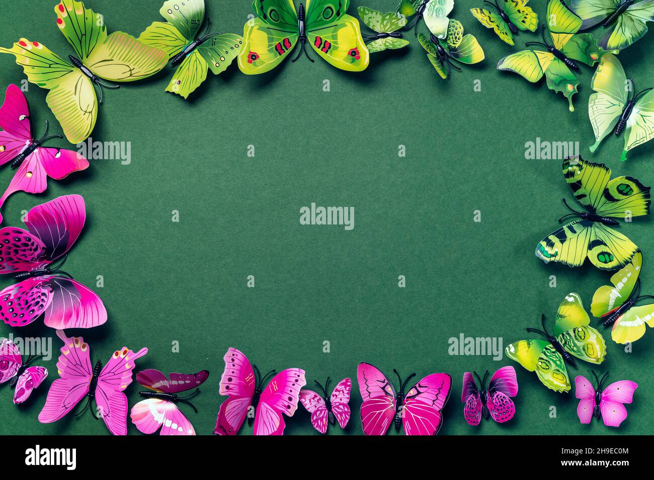 Abstract green background with butterflies Stock Photo - Alamy