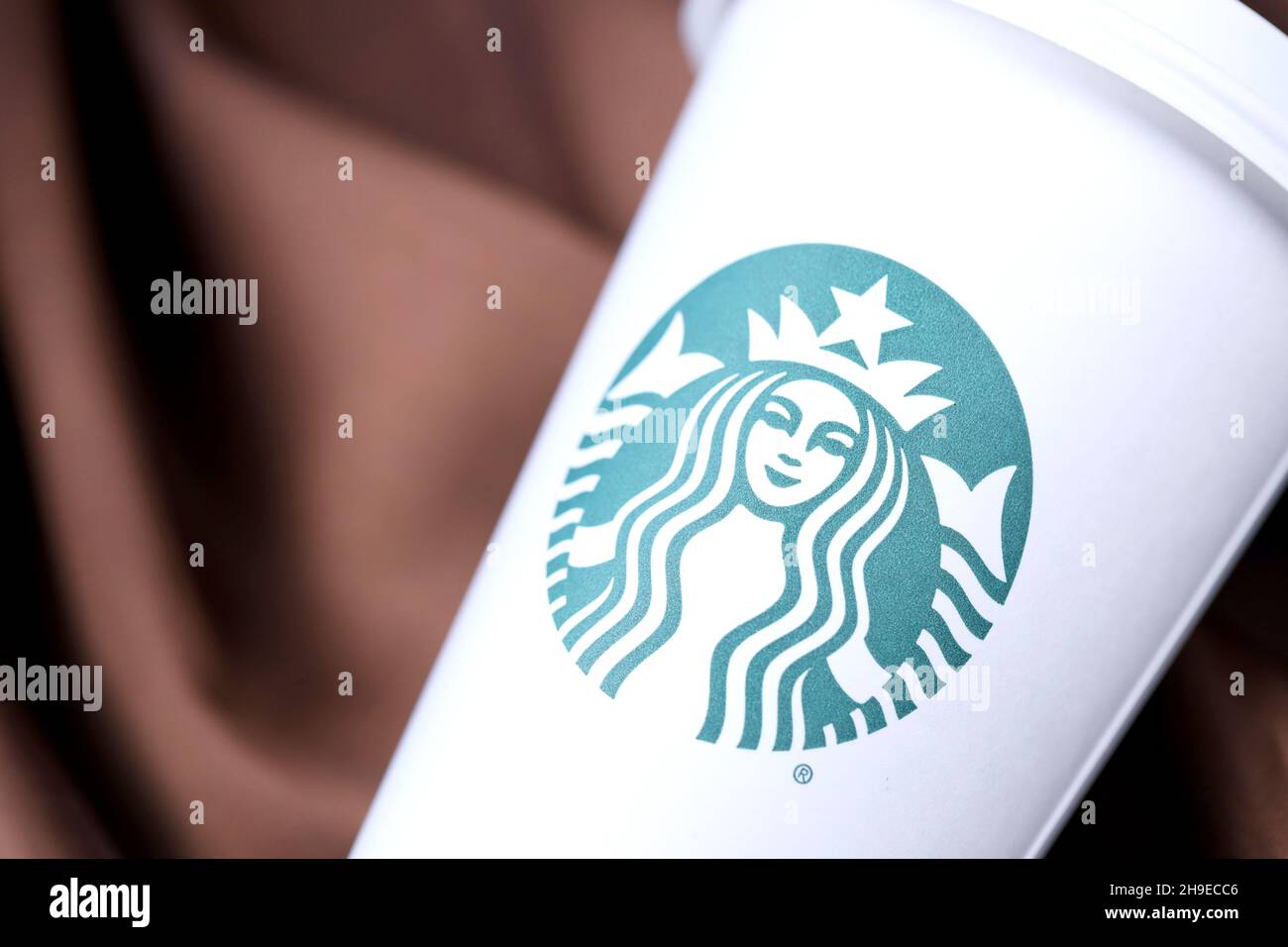 KHARKOV, UKRAINE - MARCH 15, 2021: Starbucks cup with green logo ...