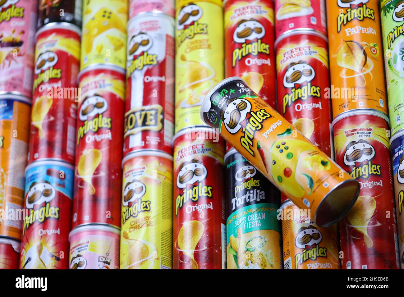 KHARKOV, UKRAINE - MARCH 30, 2021: Many Pringles cylinder chips boxes ...
