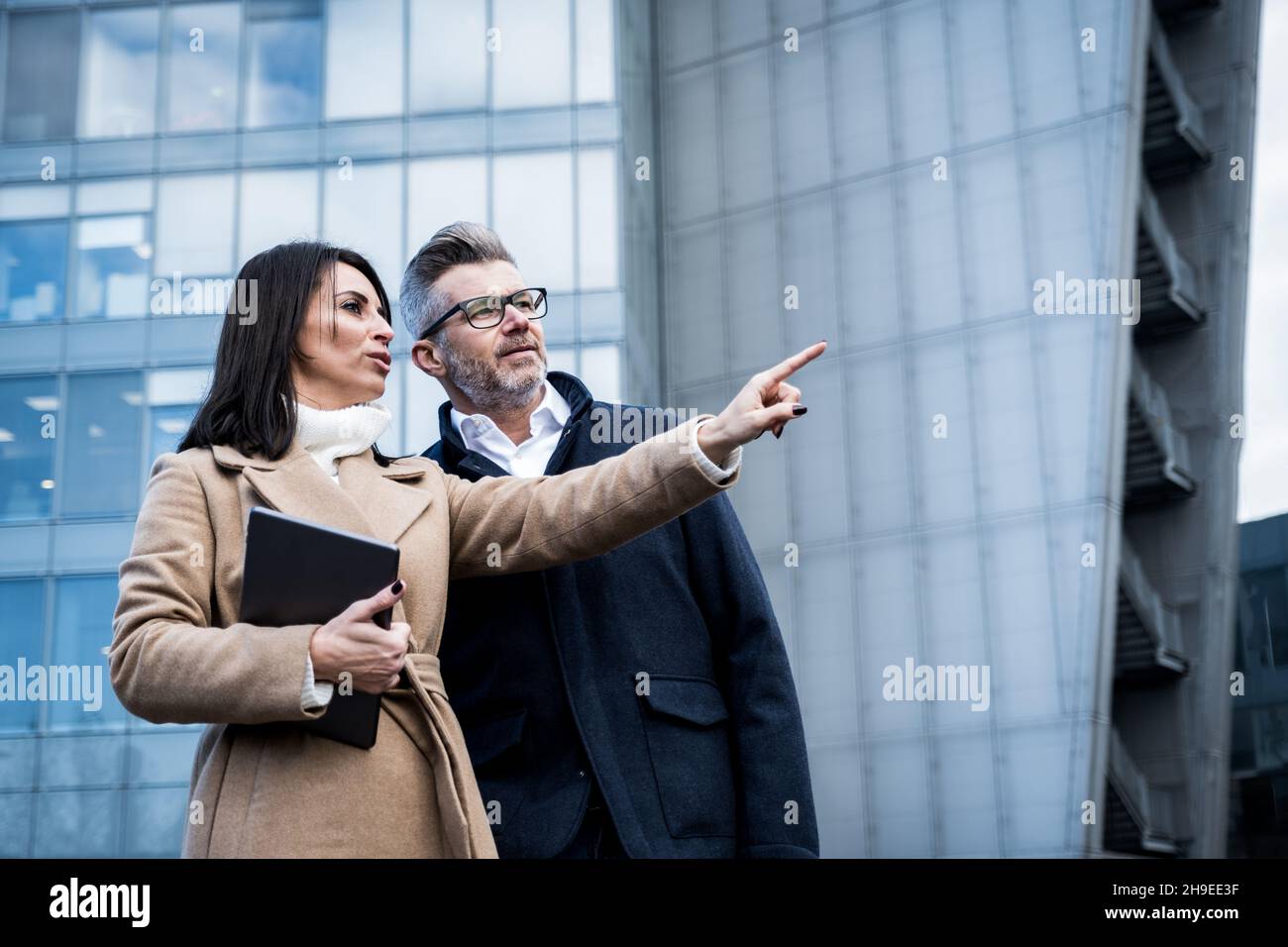 Business people looking away and bringing new business ideas in to life ...