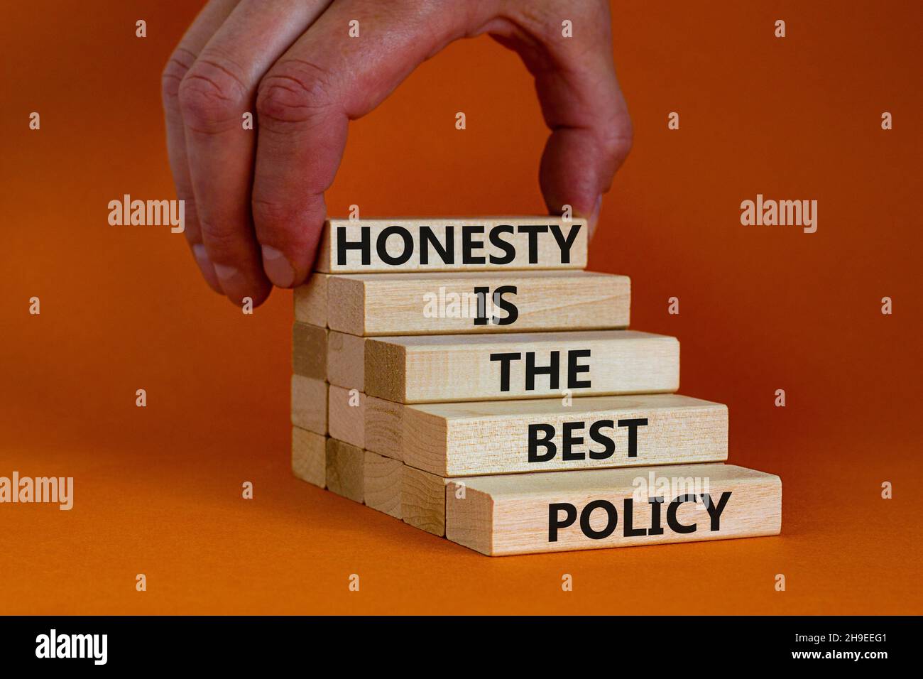 Honesty is the best policy symbol. Wooden blocks with words Honesty is ...