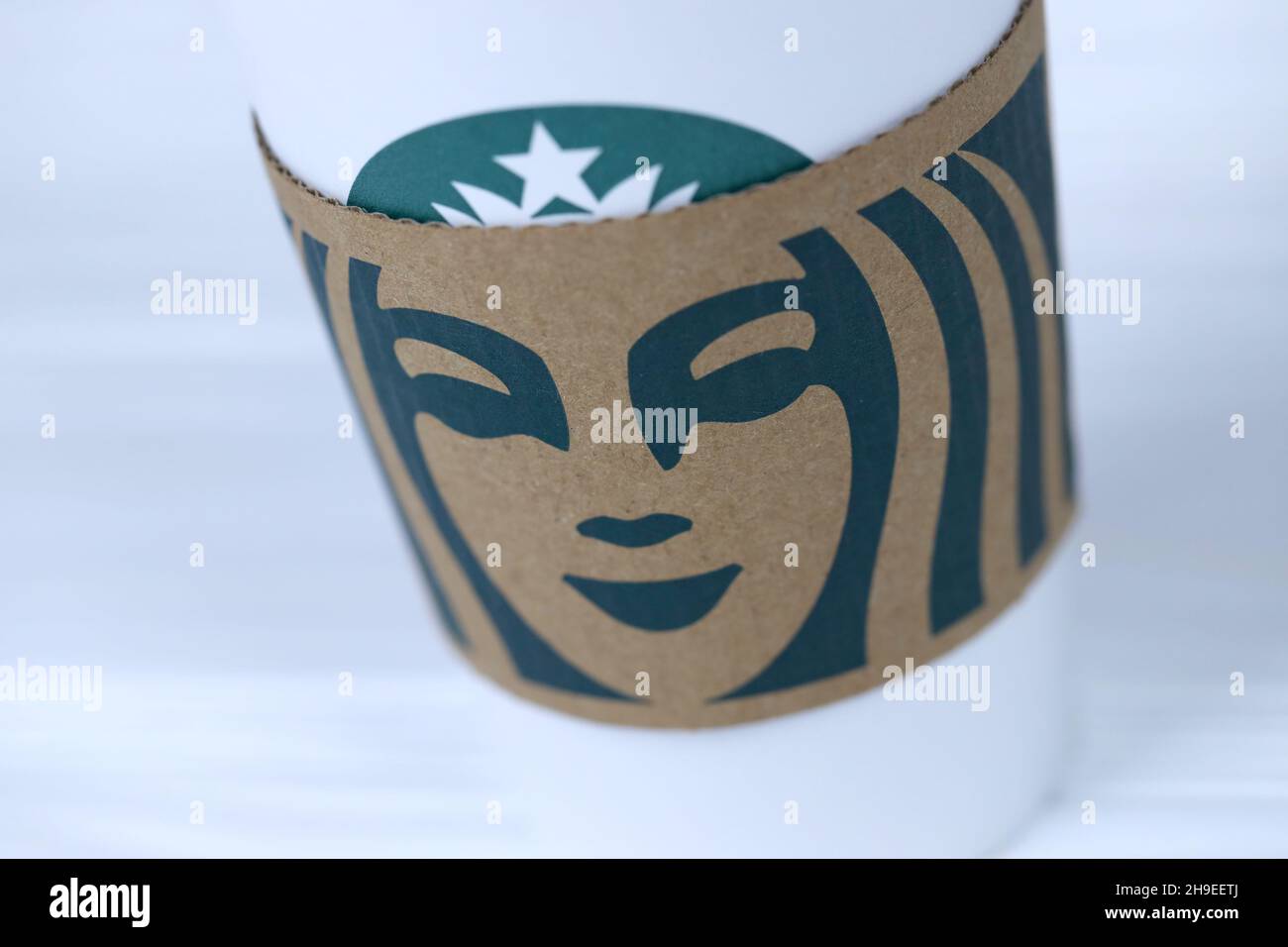 KHARKOV, UKRAINE - MARCH 15, 2021: Starbucks cup with green logo ...