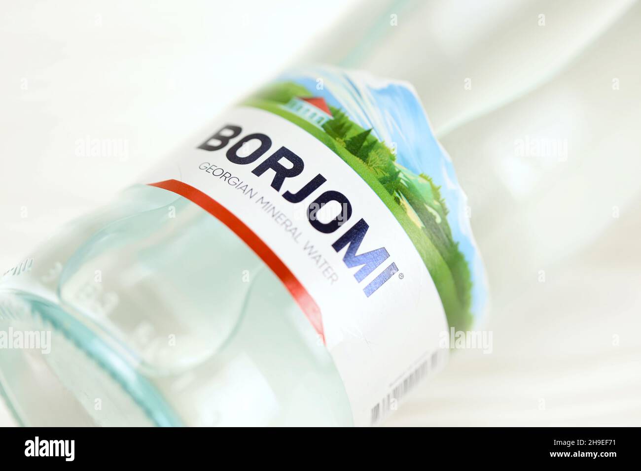 KHARKOV, UKRAINE - JULY 2, 2021: Glass of Borjomi brand of naturally ...