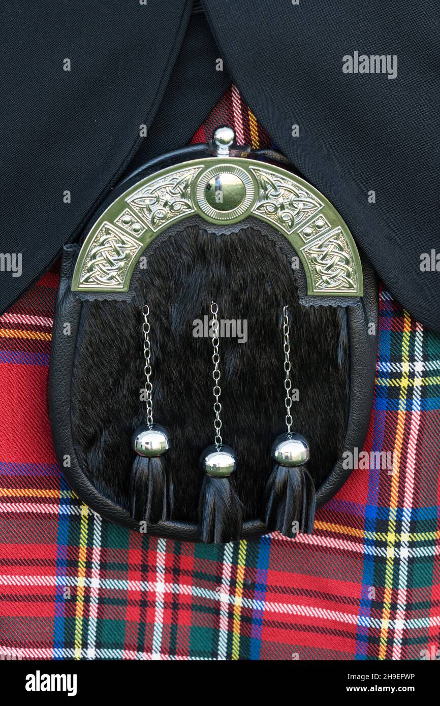 A sporran or pouch is worn as part of the Highland Scots outfit with ...