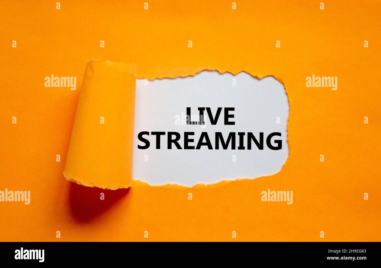 Live streaming symbol. Concept words Live streaming appearing behind ...