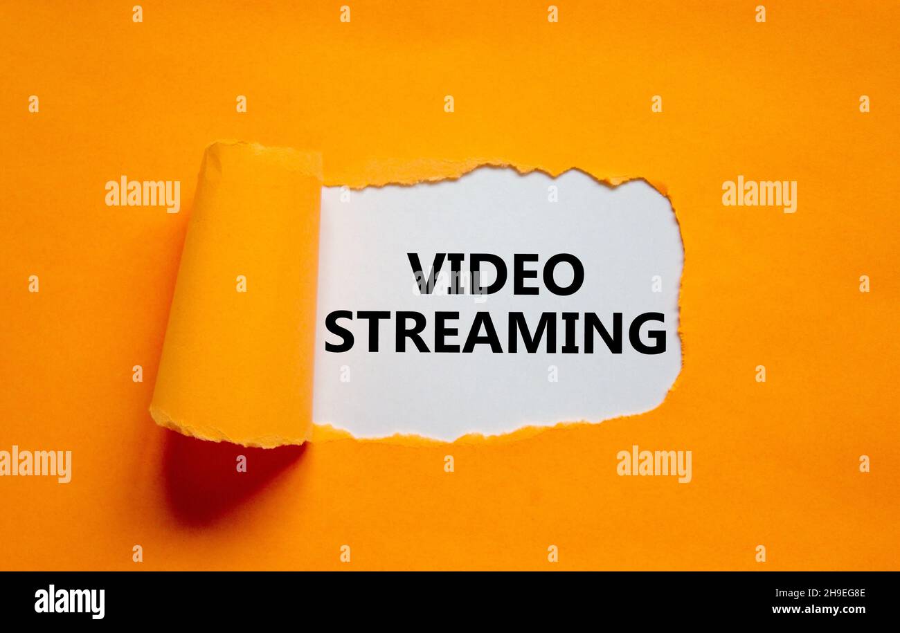 Video streaming symbol. Concept words Video streaming appearing behind ...
