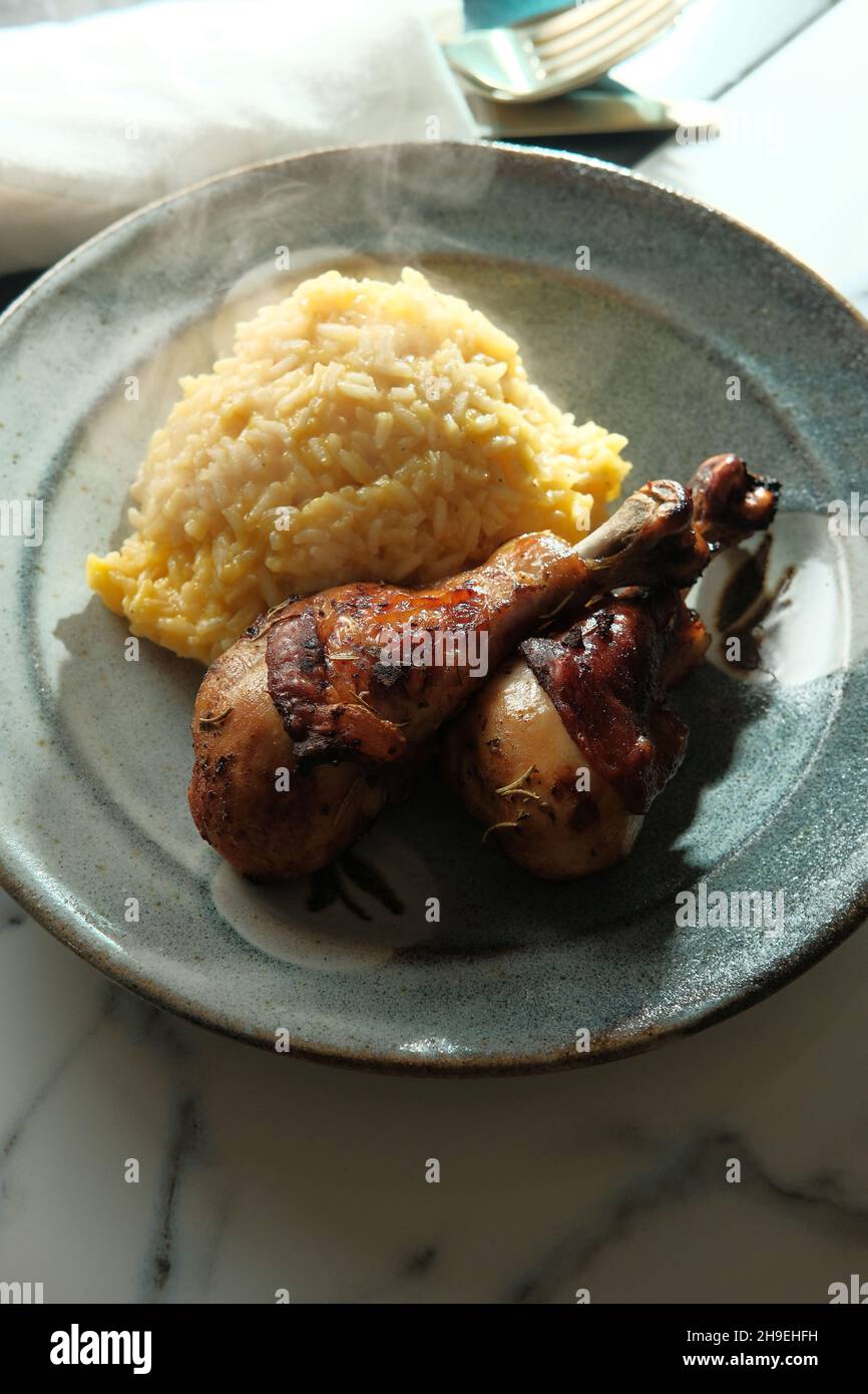 Peruvian dinner pollo a la brasa chicken legs with Aji Amarillo rice ...