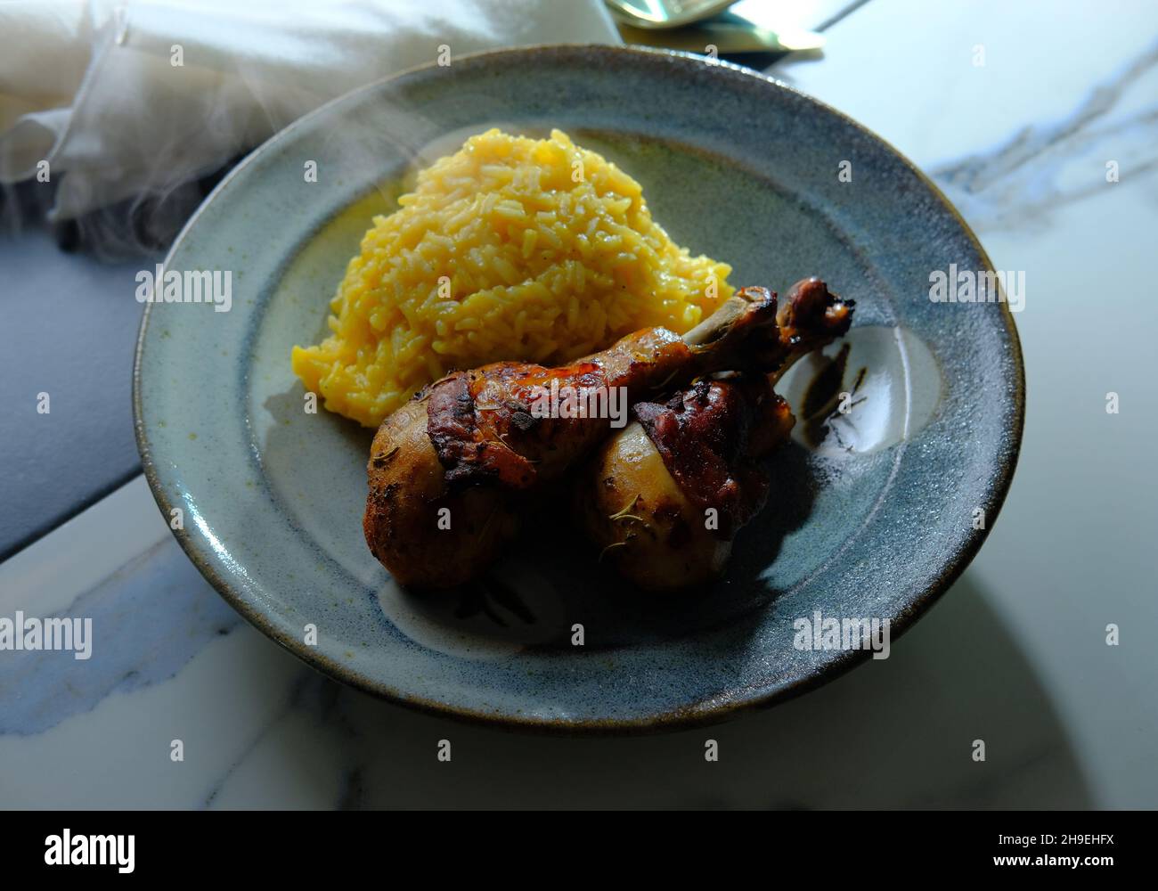 Peruvian dinner pollo a la brasa chicken legs with Aji Amarillo rice ...