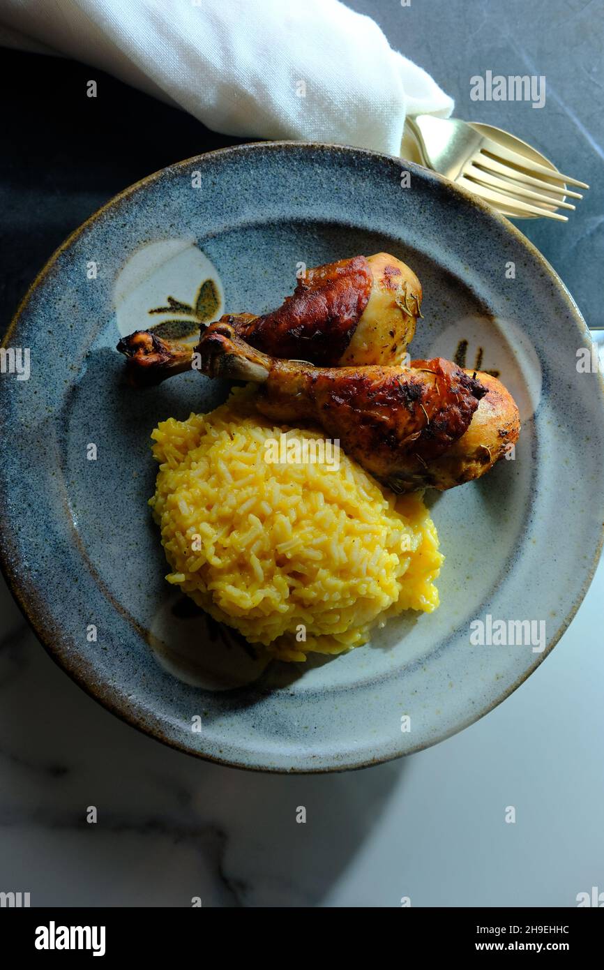 Peruvian dinner pollo a la brasa chicken legs with Aji Amarillo rice ...