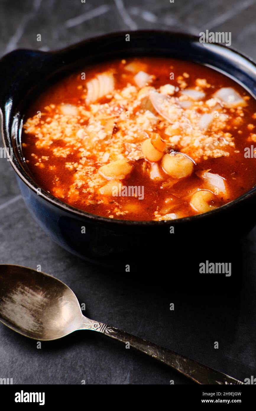 Mexican Pozole rojo chicken and hominy stew with crumbled cotija cheese ...