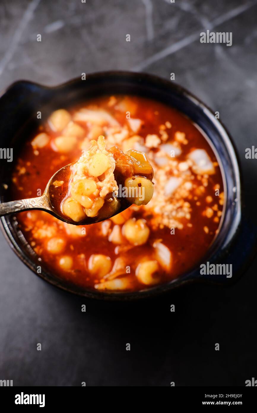 Mexican Pozole rojo chicken and hominy stew with crumbled cotija cheese ...