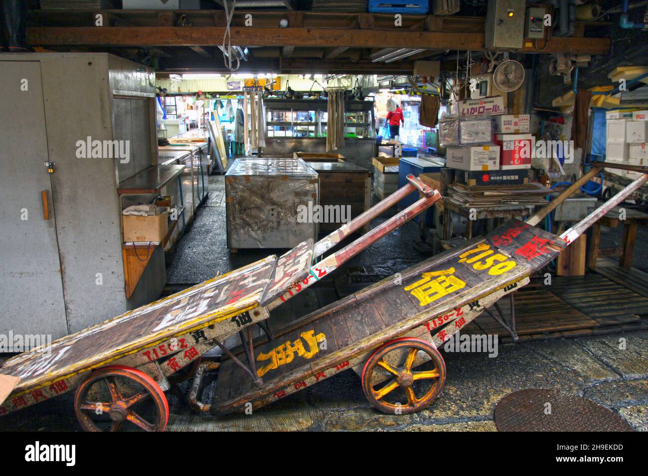 Barrows inside theTsukiji Fish Market in Tokyo. The barrows are used to ...