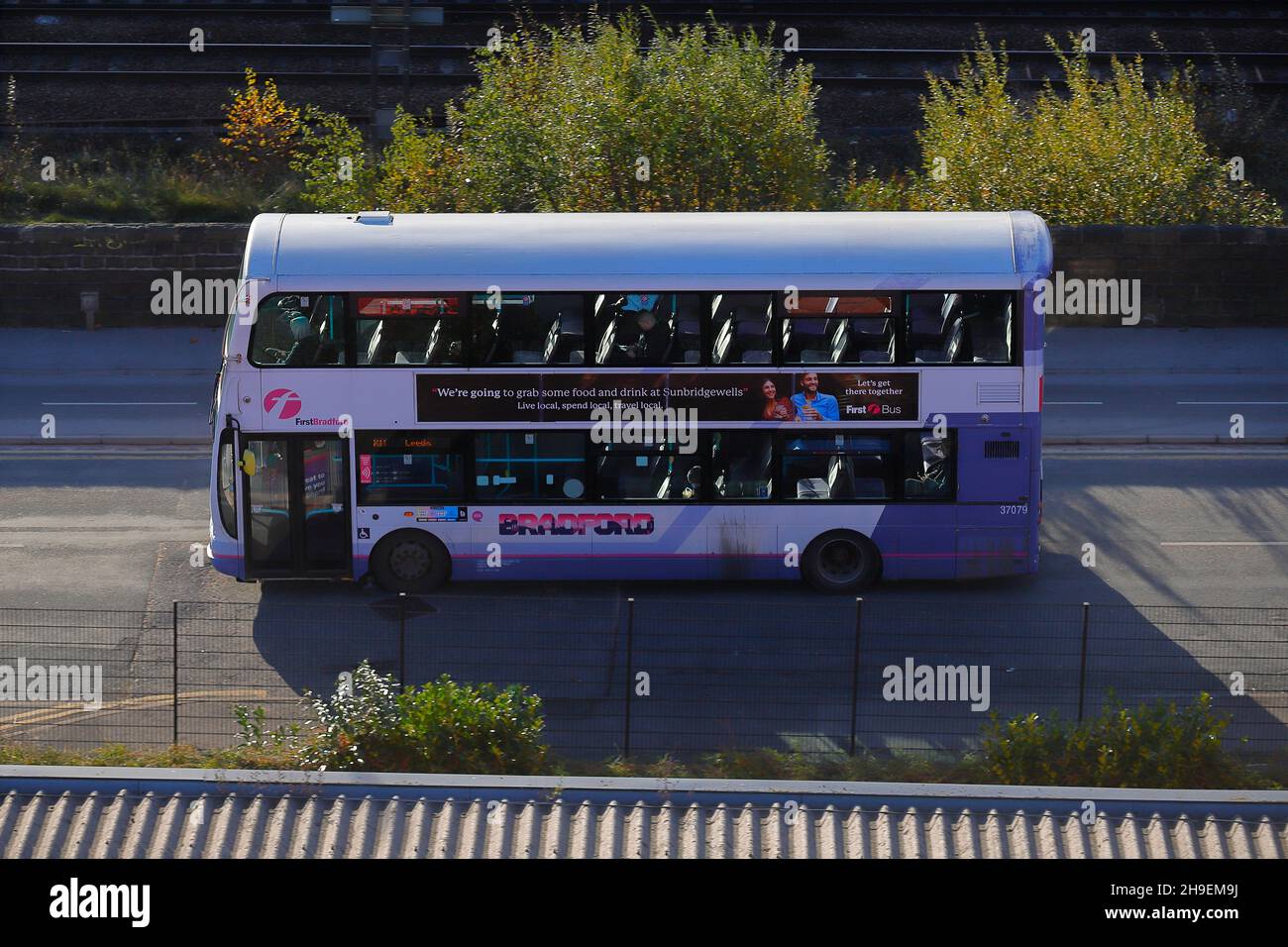 A double decker bus arriving in Leeds from Bradford Stock Photo - Alamy