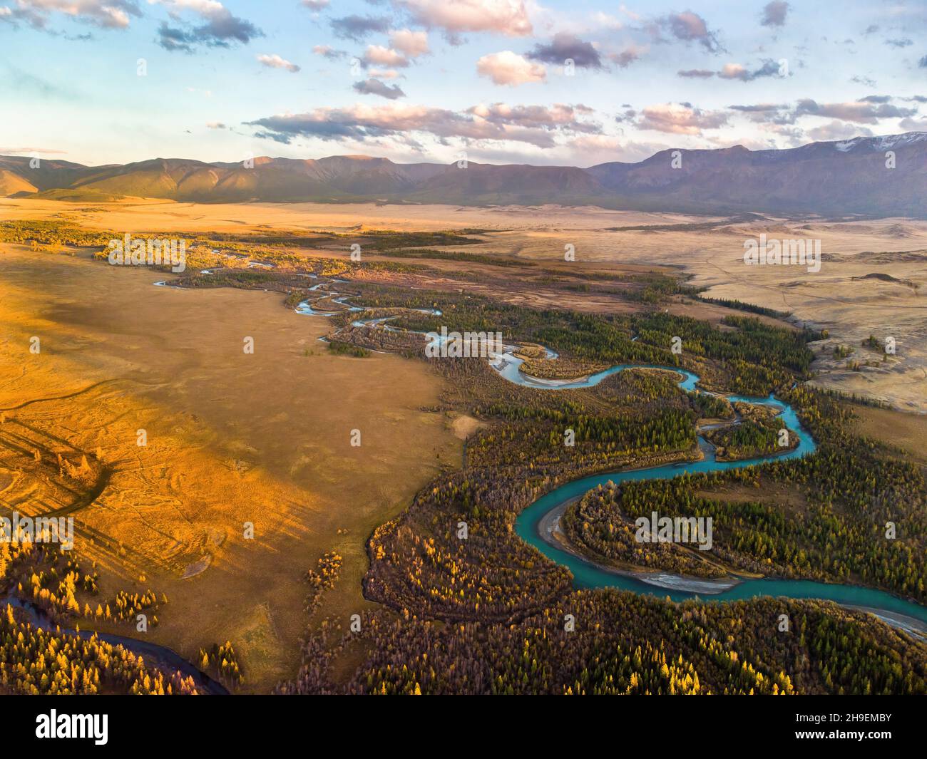 Kurai steppe and Chuya river on North-Chui ridge background. Altai ...