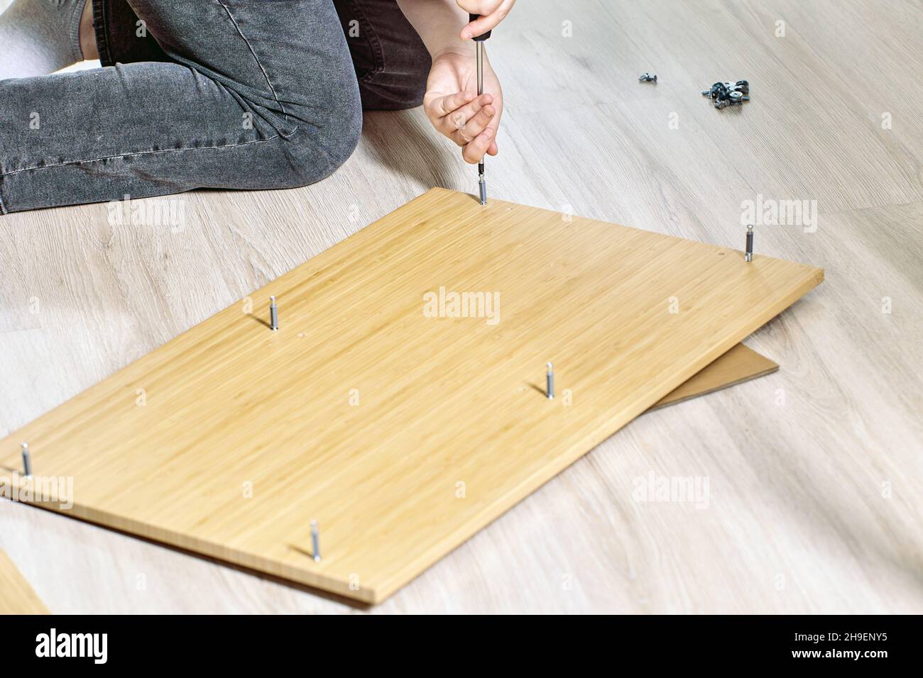Self assembly of furniture from flat pack Stock Photo - Alamy