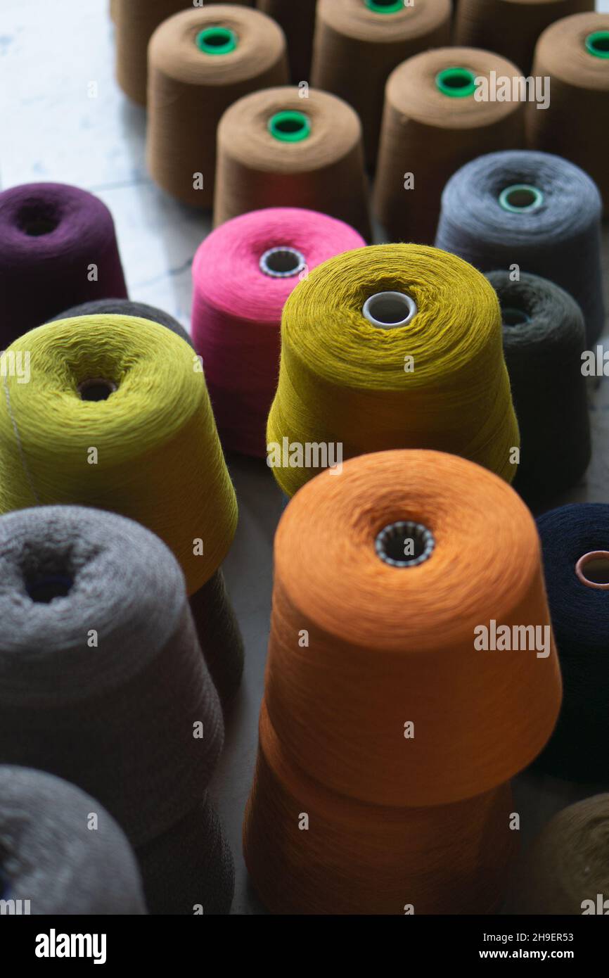 Bobbins colored thread industrial hi-res stock photography and images ...