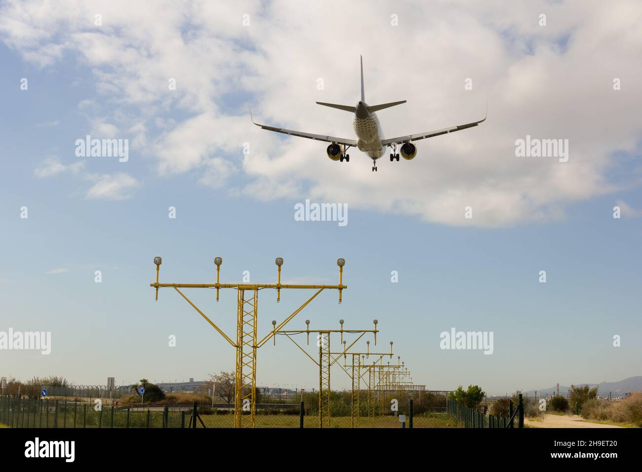 Passenger aircraft on approach to the airport for landing Stock Photo ...