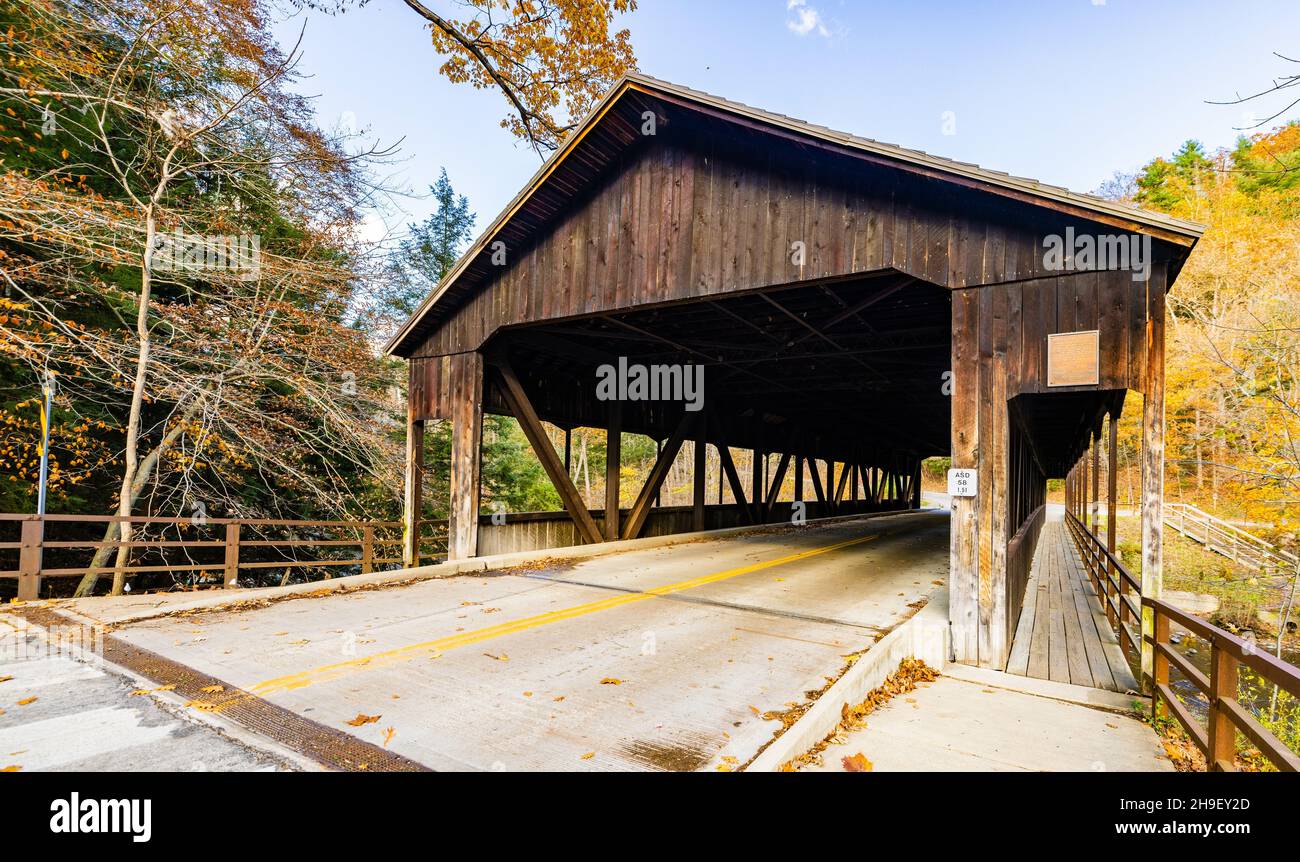 Covered bridge is timber truss bridge with roof and siding hi-res stock ...