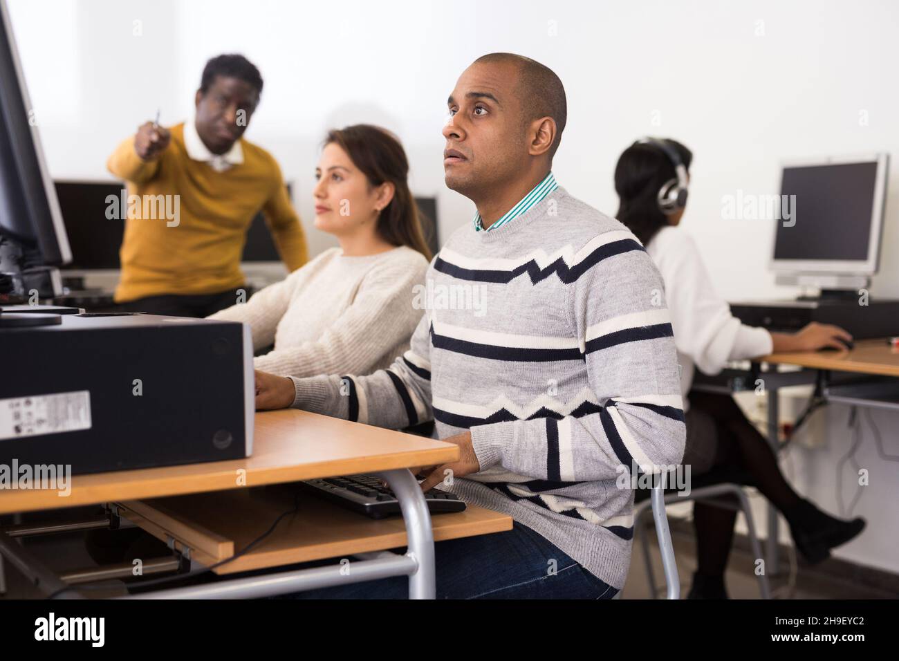 Diverse adult class test hi-res stock photography and images - Alamy