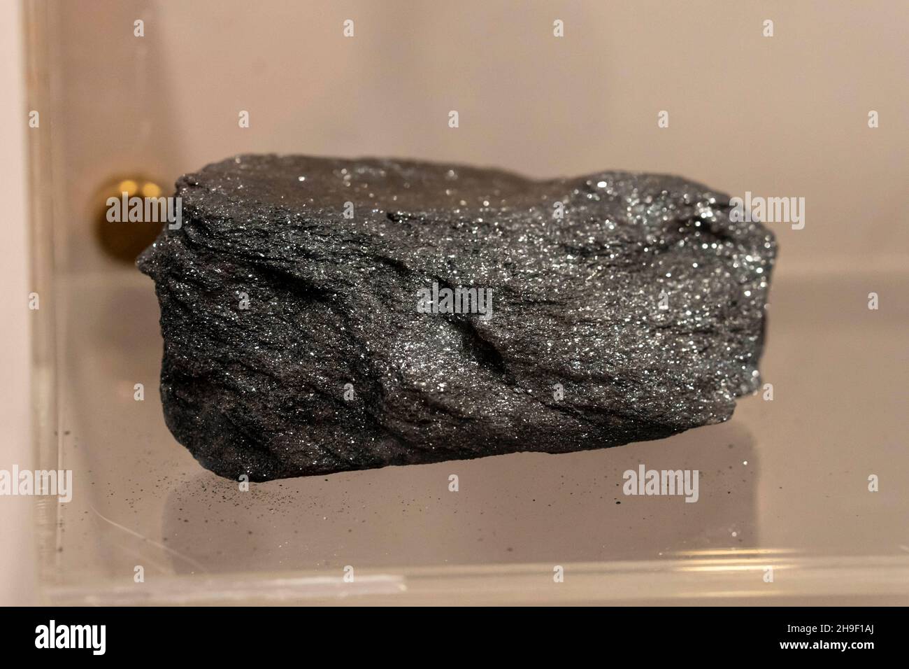 Hematite, Micaceous black collection stone on display (selective focus ...