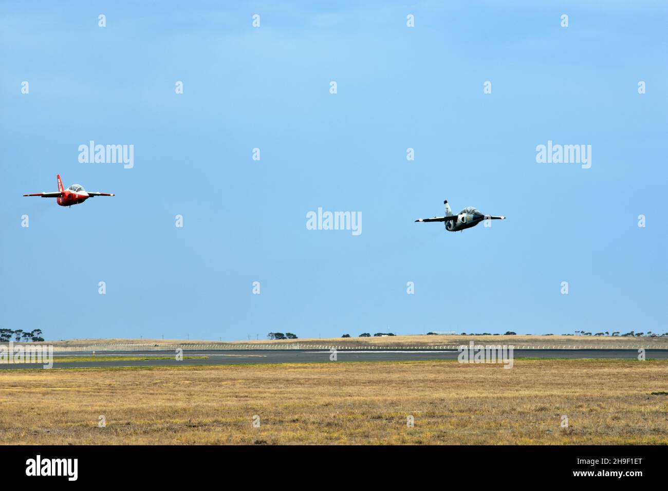 Two Jet aircraft flying in formation at low level Stock Photo - Alamy