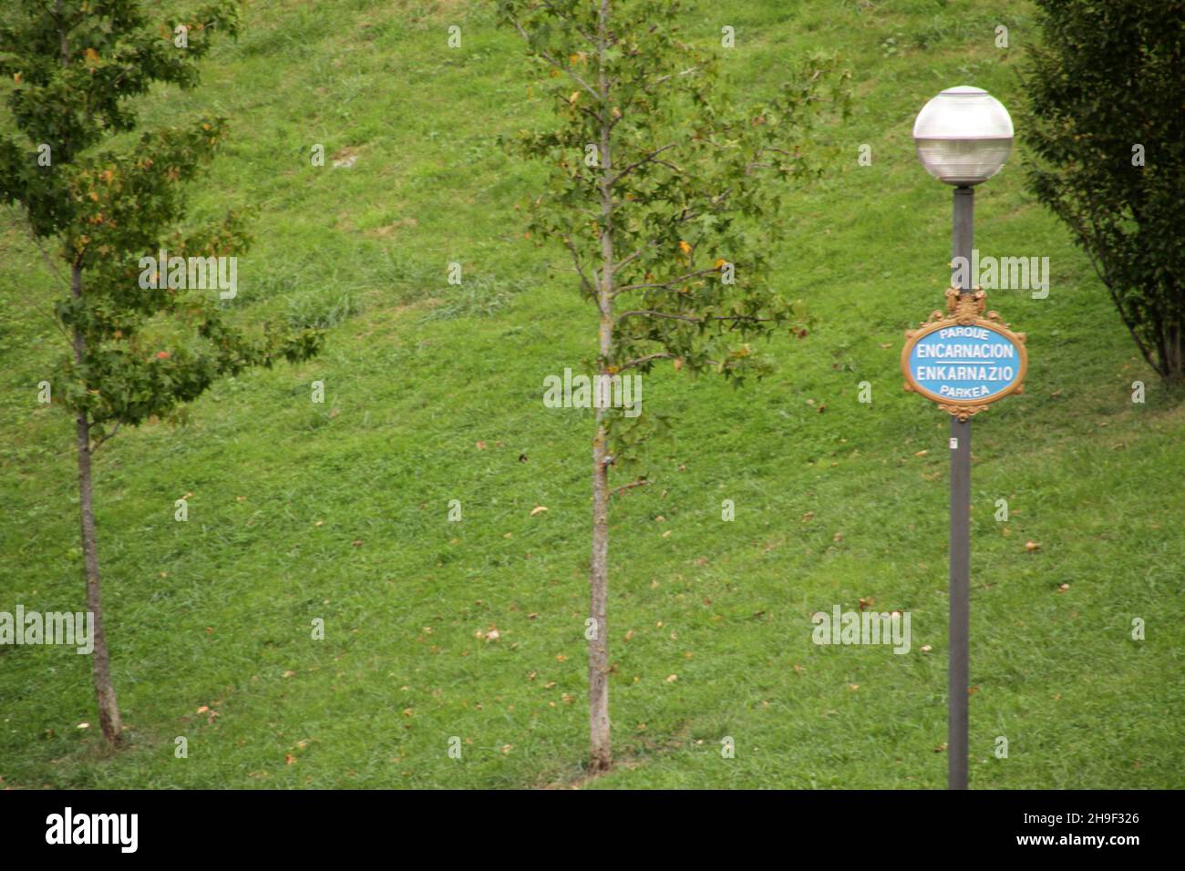 Landscape view of a green area and signs Stock Photo - Alamy