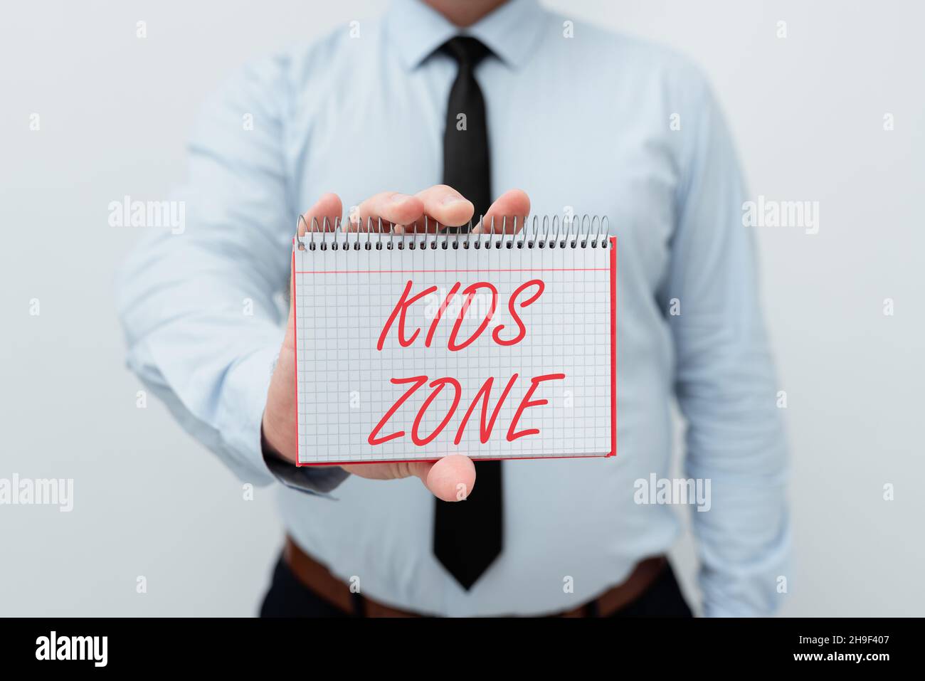 Hand writing sign Kids Zone. Concept meaning An area or a region ...