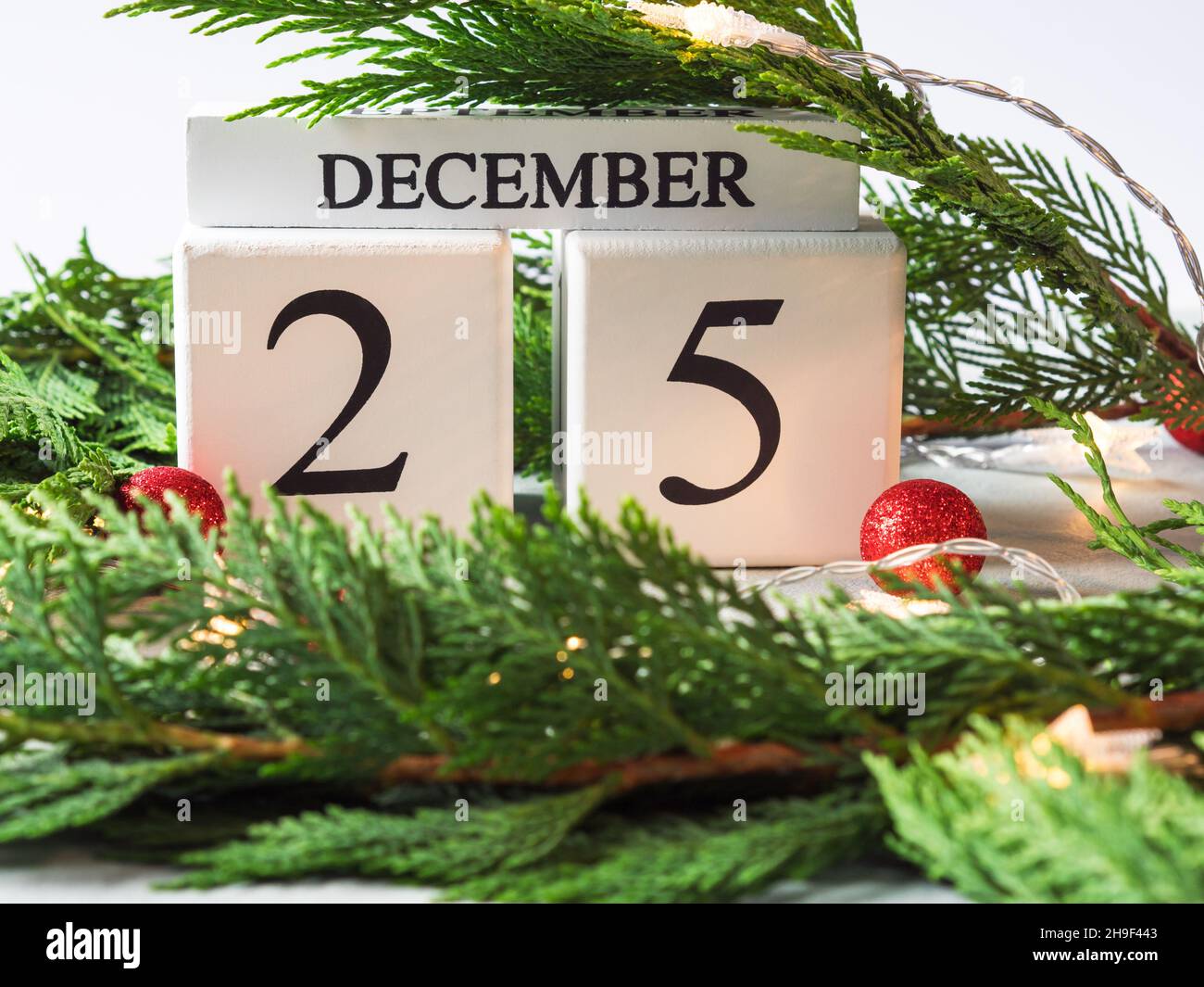 December 25 Cristmas date on calendar in green branches frame Stock ...