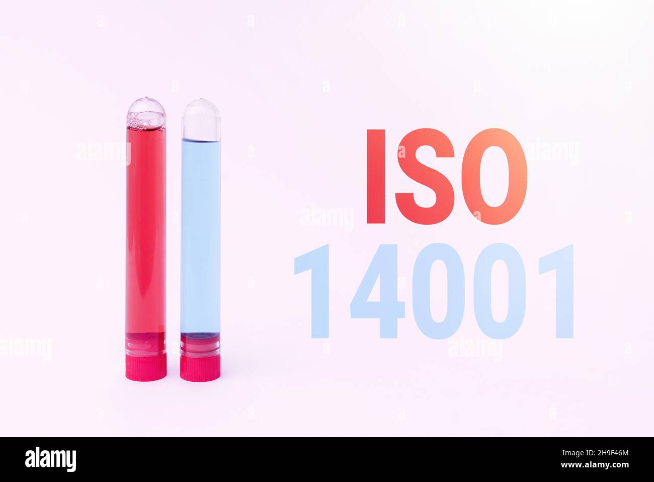 Hand writing sign Iso 14001. Word for a family of standards related to ...