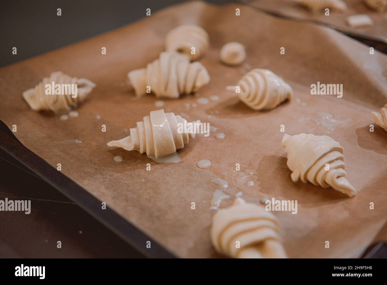 Process of baking french croissants in a kitchen Stock Photo - Alamy