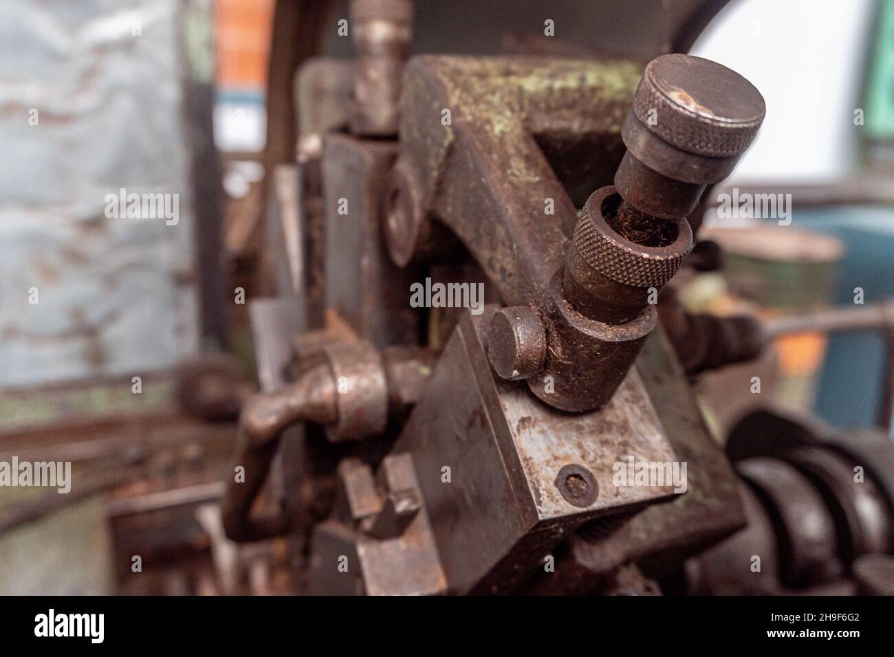 Old rusty lathe hi-res stock photography and images - Alamy