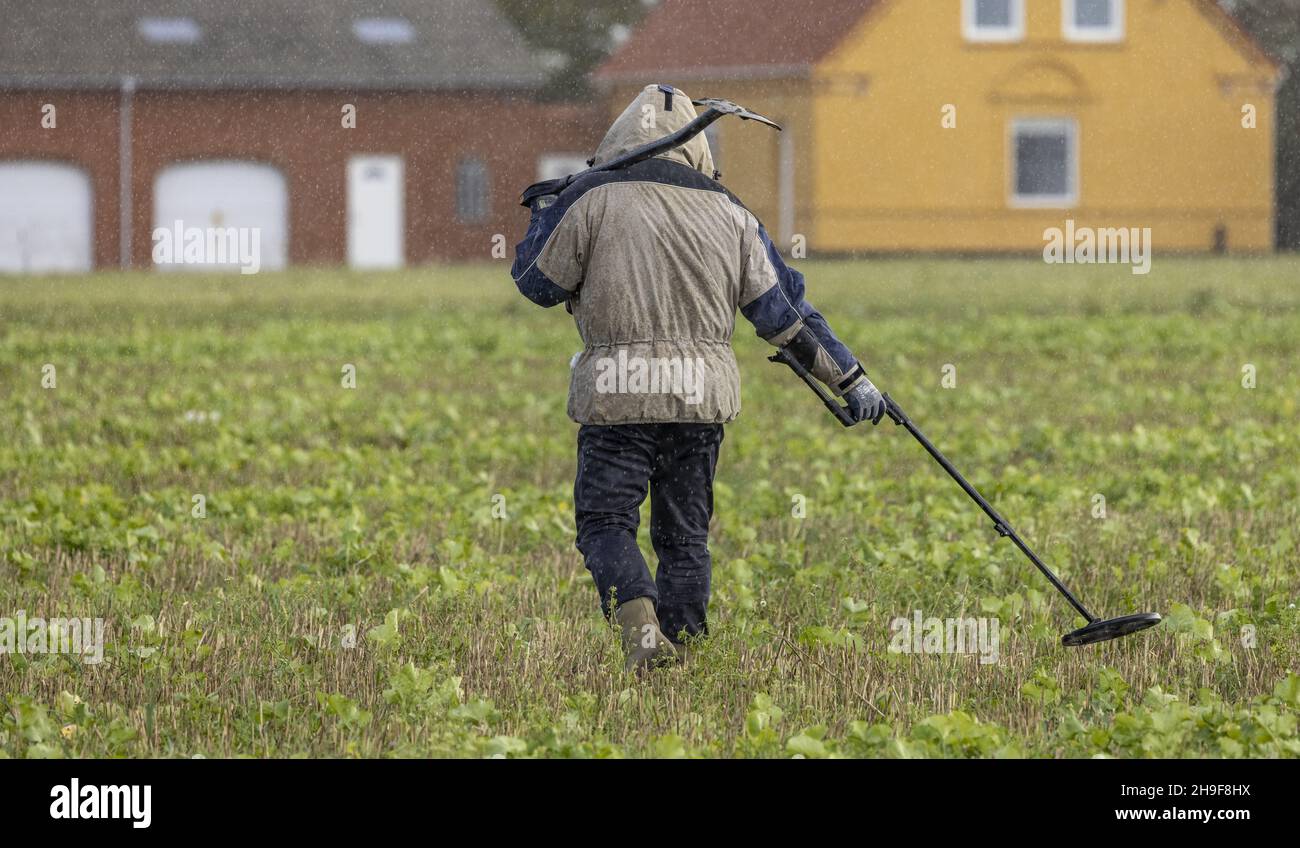 Detectorist on field Stock Photo - Alamy